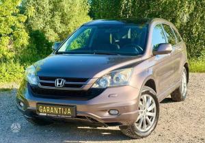 Brown Honda CR-V 2011 in Siauliai, with an engine capacity of 2.20 L and mileage of 245 thousand km for 8999 €, photo 3 on AUTOMOTO.COM.LV