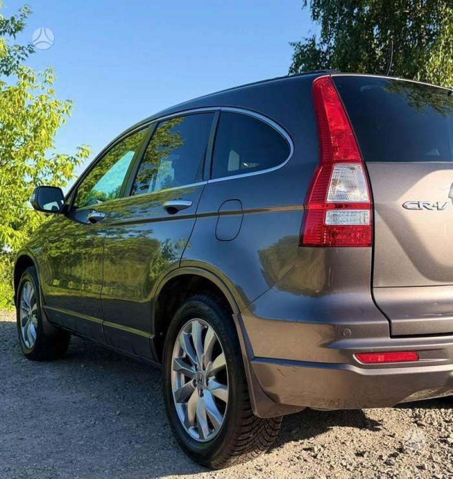 Brown Honda CR-V 2011 in Siauliai, with an engine capacity of 2.20 L and mileage of 245 thousand km for 8999 €, photo 10 on AUTOMOTO.COM.LV
