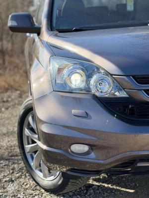 Brown Honda CR-V 2011 in Siauliai, with an engine capacity of 2.20 L and mileage of 245 thousand km for 8999 €, photo 18 on AUTOMOTO.COM.LV