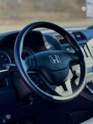 Brown Honda CR-V 2011 in Siauliai, with an engine capacity of 2.20 L and mileage of 245 thousand km for 8999 €, photo 21 on AUTOMOTO.COM.LV