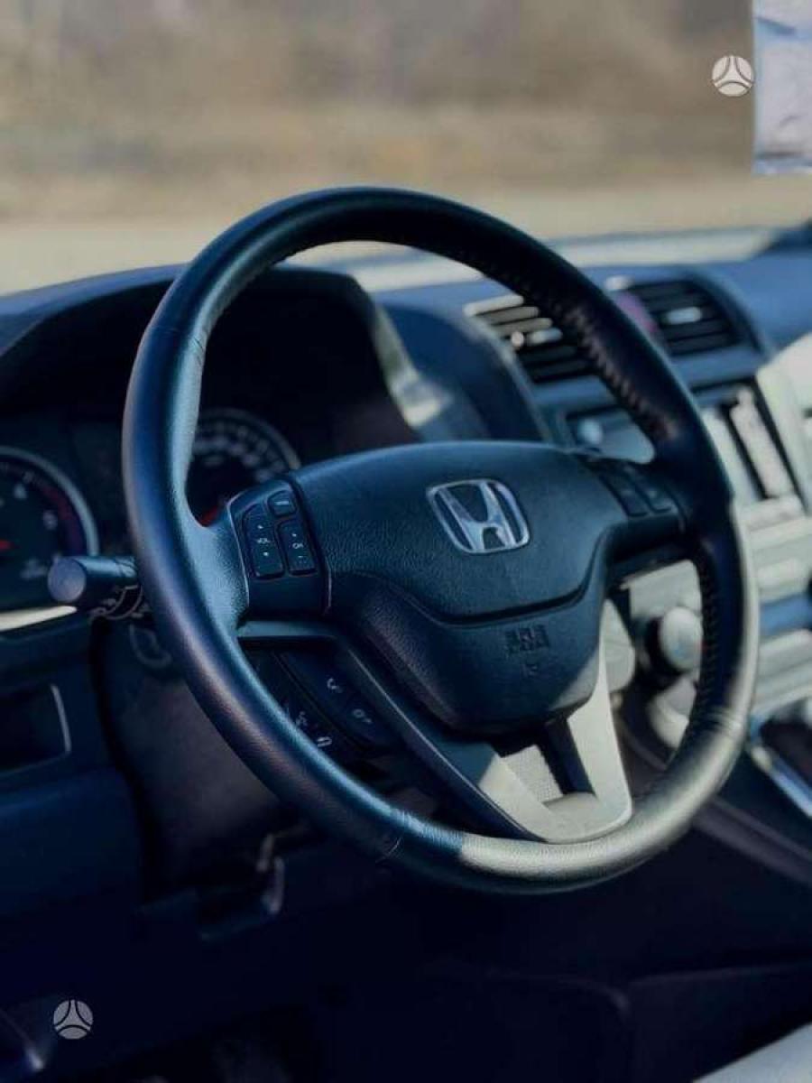 Brown Honda CR-V 2011 in Siauliai, with an engine capacity of 2.20 L and mileage of 245 thousand km for 8999 €, photo 21 on AUTOMOTO.COM.LV