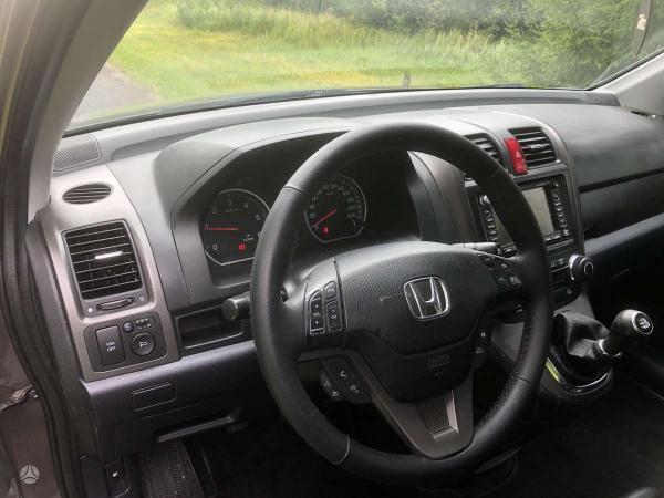 Brown Honda CR-V 2011 in Utena, with an engine capacity of 2.20 L and mileage of 263 thousand km for 5700 €, photo 7 on AUTOMOTO.COM.LV