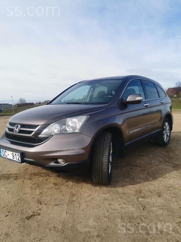 Brown Honda CR-V 2012 in Daugavpils, with an engine capacity of 2.20 L and mileage of 234 thousand km for 14000 €, photo 2 on AUTOMOTO.COM.LV