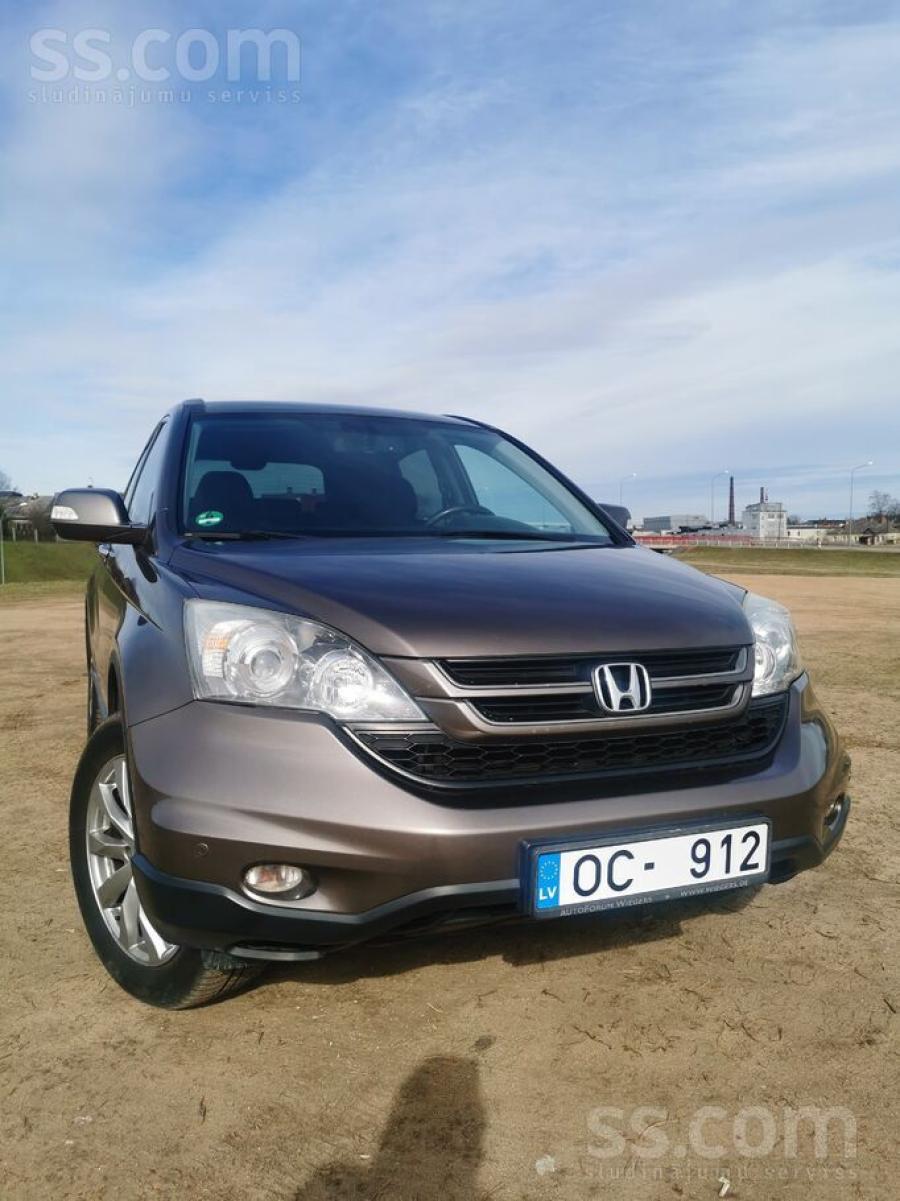 Brown Honda CR-V 2012 in Daugavpils, with an engine capacity of 2.20 L and mileage of 234 thousand km for 14000 €, photo 3 on AUTOMOTO.COM.LV