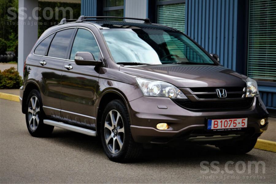 Brown Honda CR-V 2012 in Riga, with an engine capacity of 2.20 L and mileage of 229 thousand km for 20990 €, photo 5 on AUTOMOTO.COM.LV