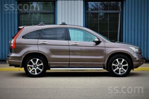 Brown Honda CR-V 2012 in Riga, with an engine capacity of 2.20 L and mileage of 229 thousand km for 20990 €, photo 6 on AUTOMOTO.COM.LV