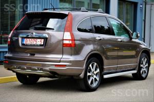 Brown Honda CR-V 2012 in Riga, with an engine capacity of 2.20 L and mileage of 229 thousand km for 20990 €, photo 7 on AUTOMOTO.COM.LV