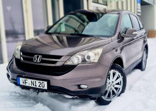 Brown Honda CR-V 2012 in Vilnius, with an engine capacity of 2.20 L and mileage of 248 thousand km for 8450 €, photo 1 on AUTOMOTO.COM.LV