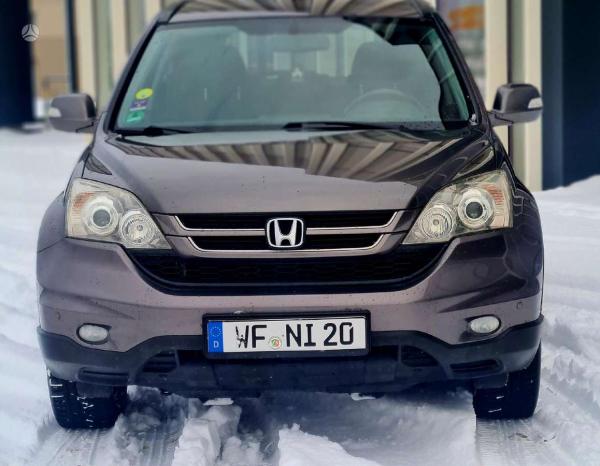 Brown Honda CR-V 2012 in Vilnius, with an engine capacity of 2.20 L and mileage of 248 thousand km for 8450 €, photo 4 on AUTOMOTO.COM.LV