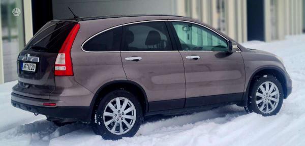 Brown Honda CR-V 2012 in Vilnius, with an engine capacity of 2.20 L and mileage of 248 thousand km for 8450 €, photo 10 on AUTOMOTO.COM.LV