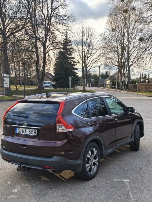 Brown Honda CR-V 2012 in Vilnius, with an engine capacity of 2.20 L and mileage of 255 thousand km for 9000 €, photo 2 on AUTOMOTO.COM.LV