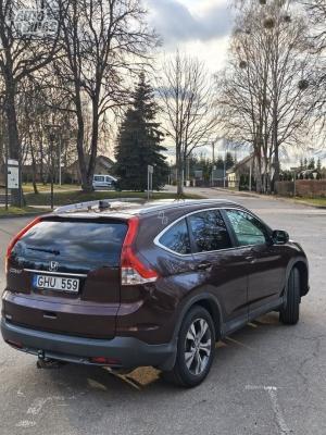 Brown Honda CR-V 2012 in Vilnius, with an engine capacity of 2.20 L and mileage of 255 thousand km for 9000 €, photo 3 on AUTOMOTO.COM.LV