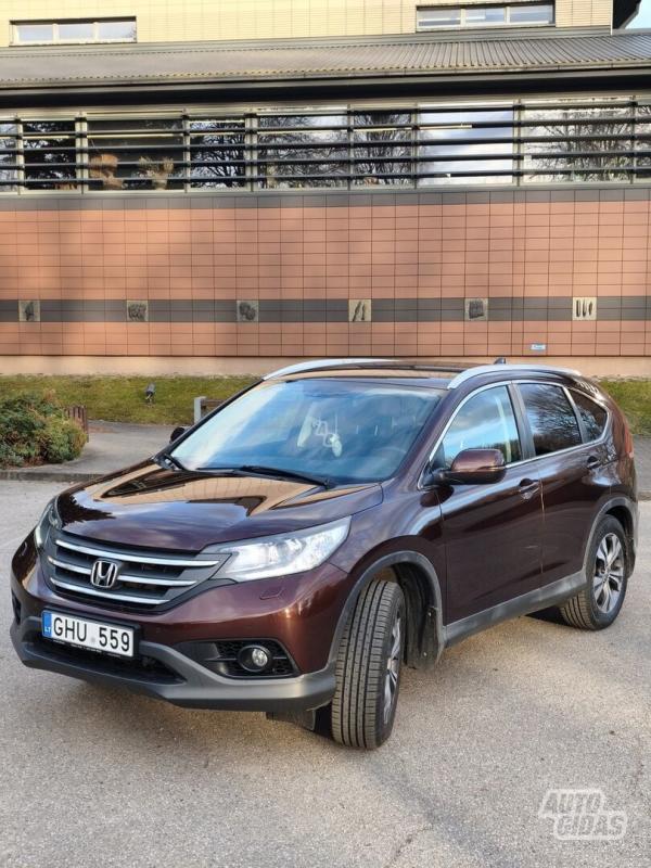 Brown Honda CR-V 2012 in Vilnius, with an engine capacity of 2.20 L and mileage of 255 thousand km for 9000 €, photo 3 on AUTOMOTO.COM.LV