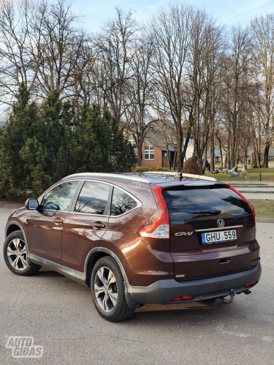 Brown Honda CR-V 2012 in Vilnius, with an engine capacity of 2.20 L and mileage of 255 thousand km for 9000 €, photo 5 on AUTOMOTO.COM.LV