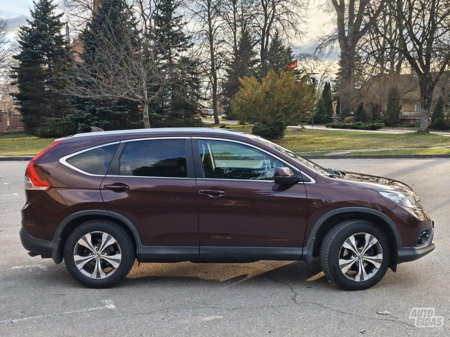 Brown Honda CR-V 2012 in Vilnius, with an engine capacity of 2.20 L and mileage of 255 thousand km for 9000 €, photo 6 on AUTOMOTO.COM.LV