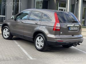 Brown Honda CR-V 2012 in Jurmala, with an engine capacity of 2.20 L and mileage of 0 thousand km for 7250 €, photo 3 on AUTOMOTO.COM.LV