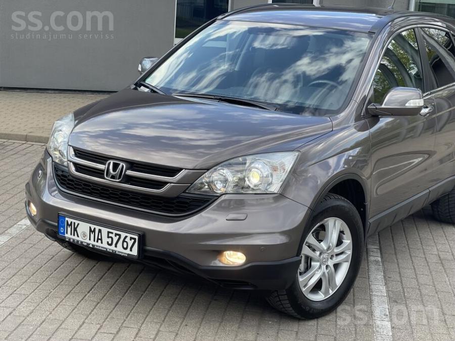 Brown Honda CR-V 2012 in Jurmala, with an engine capacity of 2.20 L and mileage of 0 thousand km for 7250 €, photo 4 on AUTOMOTO.COM.LV