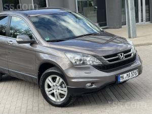 Brown Honda CR-V 2012 in Jurmala, with an engine capacity of 2.20 L and mileage of 0 thousand km for 7250 €, photo 6 on AUTOMOTO.COM.LV