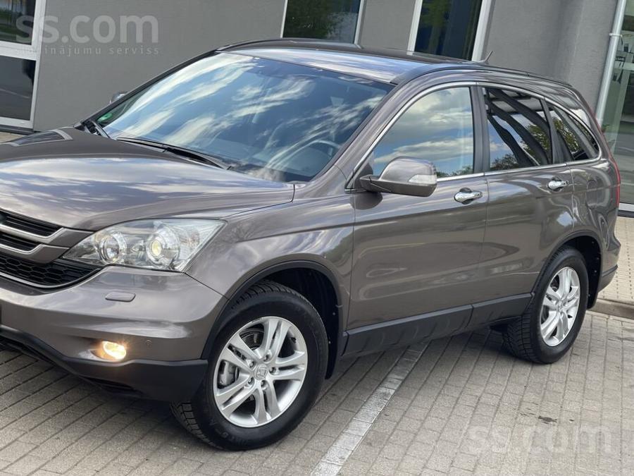 Brown Honda CR-V 2012 in Jurmala, with an engine capacity of 2.20 L and mileage of 0 thousand km for 7250 €, photo 10 on AUTOMOTO.COM.LV