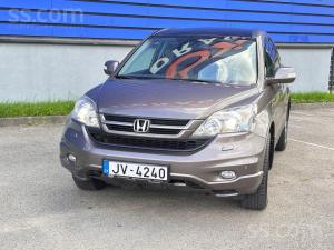 Brown Honda CR-V 2012 in Riga, with an engine capacity of 2.20 L and mileage of 226 thousand km for 6500 €, photo  on AUTOMOTO.COM.LV