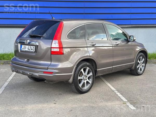 Brown Honda CR-V 2012 in Riga, with an engine capacity of 2.20 L and mileage of 226 thousand km for 6500 €, photo 2 on AUTOMOTO.COM.LV