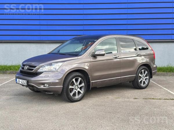 Brown Honda CR-V 2012 in Riga, with an engine capacity of 2.20 L and mileage of 226 thousand km for 6500 €, photo 3 on AUTOMOTO.COM.LV