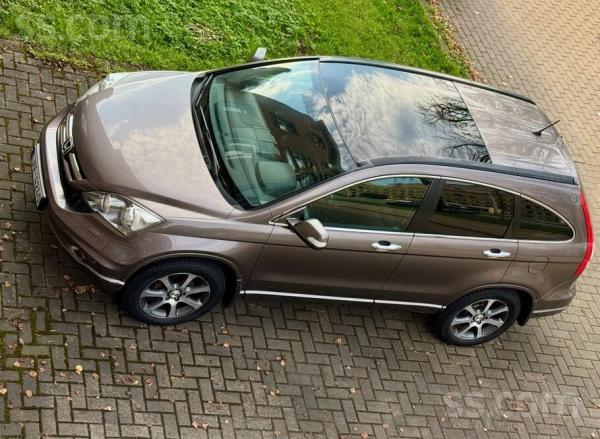 Brown Honda CR-V 2012 in Riga, with an engine capacity of 2.20 L and mileage of 226 thousand km for 6500 €, photo 4 on AUTOMOTO.COM.LV