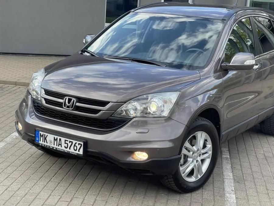 Brown Honda CR-V 2012 in Jurmala, with an engine capacity of 2.20 L and mileage of 277 thousand km for 7250 €, photo 4 on AUTOMOTO.COM.LV