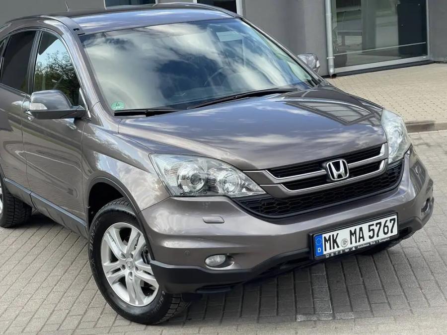 Brown Honda CR-V 2012 in Jurmala, with an engine capacity of 2.20 L and mileage of 277 thousand km for 7250 €, photo 16 on AUTOMOTO.COM.LV