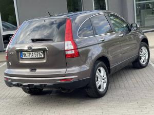Brown Honda CR-V 2012 in Jurmala, with an engine capacity of 2.20 L and mileage of 277 thousand km for 7250 €, photo 17 on AUTOMOTO.COM.LV