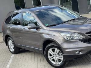 Brown Honda CR-V 2012 in Jurmala, with an engine capacity of 2.20 L and mileage of 277 thousand km for 7250 €, photo 18 on AUTOMOTO.COM.LV