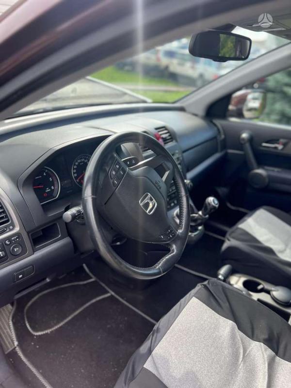 Brown Honda CR-V 2012 in Utena, with an engine capacity of 2.20 L and mileage of 250 thousand km for 7300 €, photo 9 on AUTOMOTO.COM.LV