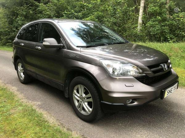 Brown Honda CR-V 2012 in Utena, with an engine capacity of 2.20 L and mileage of 270 thousand km for 6300 €, photo 4 on AUTOMOTO.COM.LV