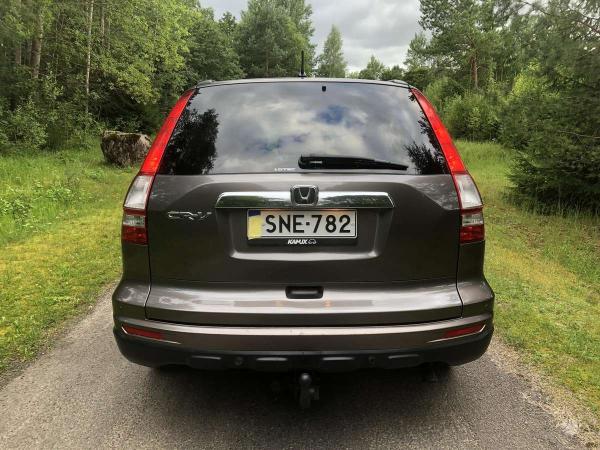 Brown Honda CR-V 2012 in Utena, with an engine capacity of 2.20 L and mileage of 270 thousand km for 6300 €, photo 5 on AUTOMOTO.COM.LV