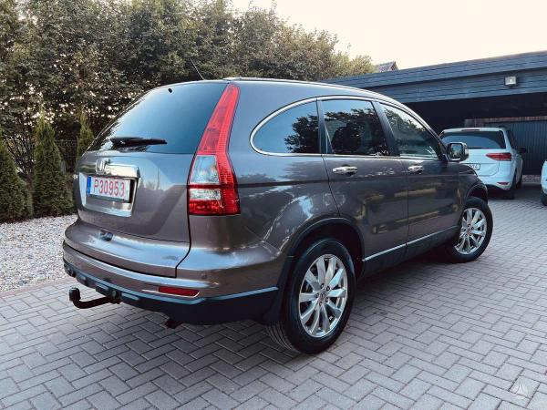 Brown Honda CR-V 2012 in Druskininkai, with an engine capacity of 2.20 L and mileage of 248 thousand km for 7690 €, photo 6 on AUTOMOTO.COM.LV