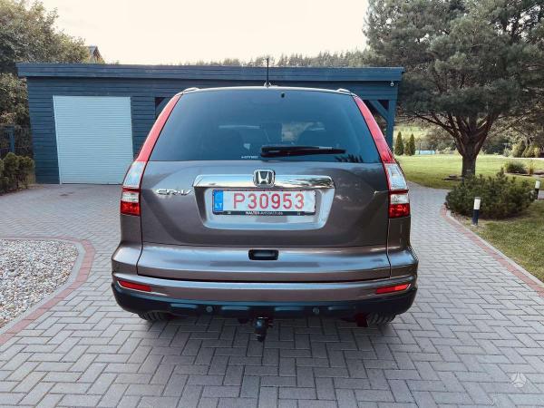 Brown Honda CR-V 2012 in Druskininkai, with an engine capacity of 2.20 L and mileage of 248 thousand km for 7690 €, photo 8 on AUTOMOTO.COM.LV