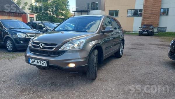 Brūns Honda CR-V 2012 Daugavpils, ar dzinēja tilpumu 2.20 L un nobraukumu 0 tūkst. km par 7850 €, foto 3 vietnē AUTOMOTO.COM.LV