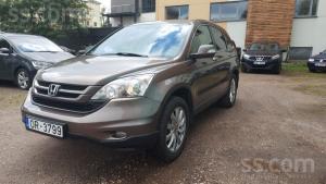 Brown Honda CR-V 2012 in Daugavpils, with an engine capacity of 2.20 L and mileage of 0 thousand km for 7850 €, photo  on AUTOMOTO.COM.LV