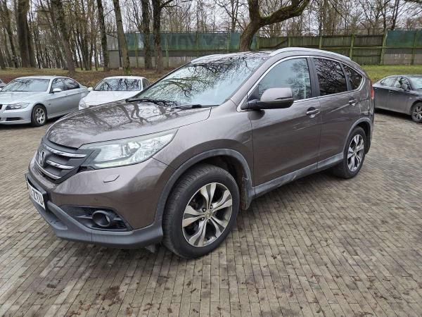 Brown Honda CR-V 2013 in Siauliai, with an engine capacity of 2.20 L and mileage of 179 thousand km for 3290 €, photo 4 on AUTOMOTO.COM.LV