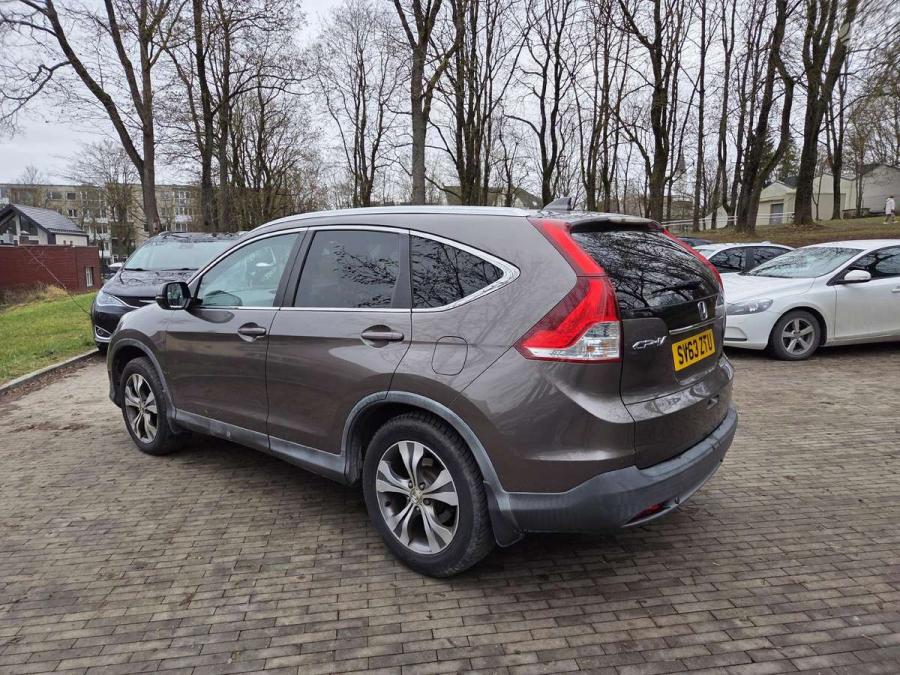 Brown Honda CR-V 2013 in Siauliai, with an engine capacity of 2.20 L and mileage of 179 thousand km for 3290 €, photo 6 on AUTOMOTO.COM.LV