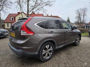 Brown Honda CR-V 2013 in Siauliai, with an engine capacity of 2.20 L and mileage of 179 thousand km for 3290 €, photo 8 on AUTOMOTO.COM.LV