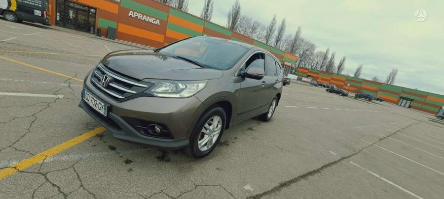 Brown Honda CR-V 2013 in Klaipeda, with an engine capacity of 2.20 L and mileage of 201 thousand km for 9400 €, photo 2 on AUTOMOTO.COM.LV