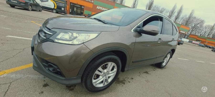 Brown Honda CR-V 2013 in Klaipeda, with an engine capacity of 2.20 L and mileage of 201 thousand km for 9400 €, photo 3 on AUTOMOTO.COM.LV