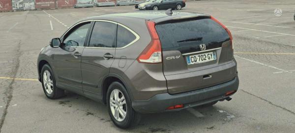 Brūns Honda CR-V 2013 Klaipėda, ar dzinēja tilpumu 2.20 L un nobraukumu 201 tūkst. km par 9400 €, foto 9 vietnē AUTOMOTO.COM.LV