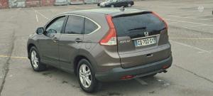 Brown Honda CR-V 2013 in Klaipeda, with an engine capacity of 2.20 L and mileage of 201 thousand km for 9400 €, photo 9 on AUTOMOTO.COM.LV