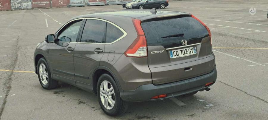 Brown Honda CR-V 2013 in Klaipeda, with an engine capacity of 2.20 L and mileage of 201 thousand km for 9400 €, photo 9 on AUTOMOTO.COM.LV