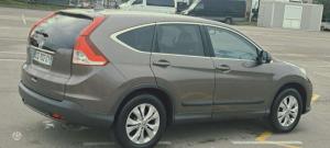 Brown Honda CR-V 2013 in Klaipeda, with an engine capacity of 2.20 L and mileage of 201 thousand km for 9400 €, photo 10 on AUTOMOTO.COM.LV