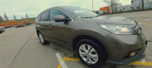 Brown Honda CR-V 2013 in Klaipeda, with an engine capacity of 2.20 L and mileage of 201 thousand km for 9400 €, photo 24 on AUTOMOTO.COM.LV