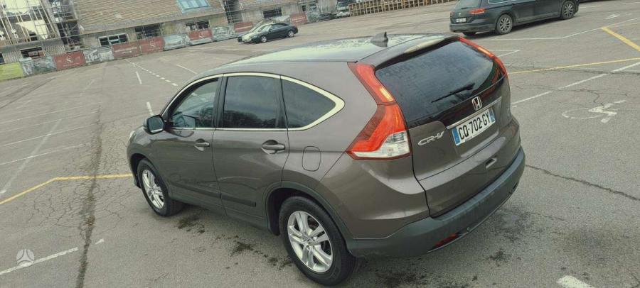 Brown Honda CR-V 2013 in Klaipeda, with an engine capacity of 2.20 L and mileage of 201 thousand km for 9400 €, photo 26 on AUTOMOTO.COM.LV