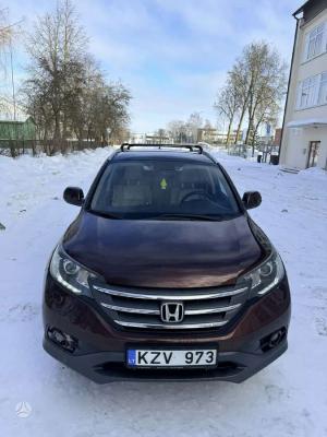 Brūns Honda CR-V 2013 Šauļi, ar dzinēja tilpumu 2.20 L un nobraukumu 256 tūkst. km par 10500 €, foto  vietnē AUTOMOTO.COM.LV
